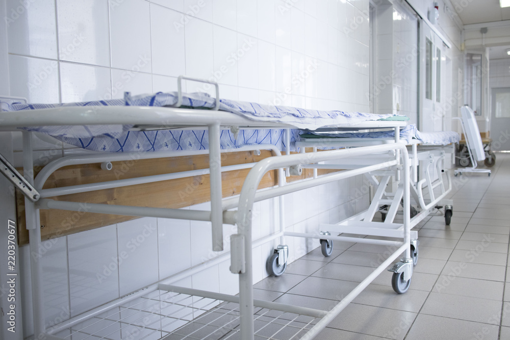 hospital bed rolling into the hallway of the hospital Stock Photo ...