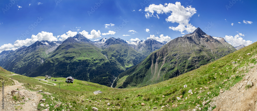 Wide panoramic view overlooking the mountain peaks, glaciers and rivers ...