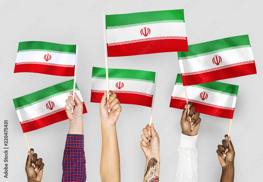 Hands waving the flags of Iran Stock Photo | Adobe Stock