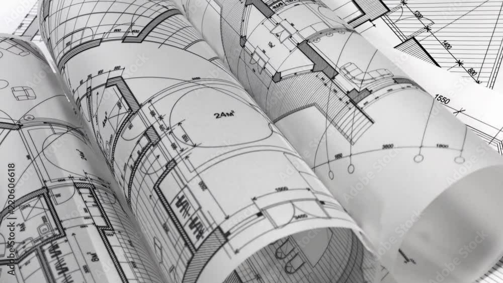 Blueprints - rolls of architectural drawings smoothly rotate on the ...