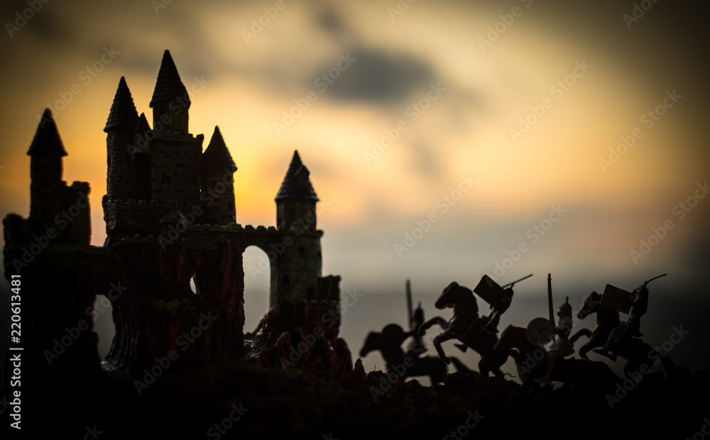 Medieval battle scene with cavalry and infantry. Silhouettes of figures ...