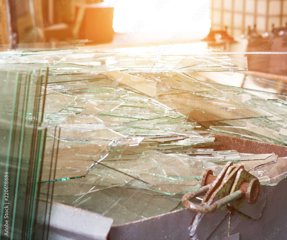 Large container with broken broken glass, manufacturing waste glass ...