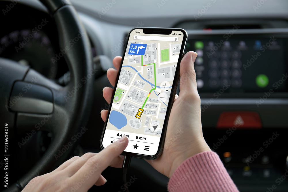 women hand holding phone with app navigation map on screen Stock Photo ...