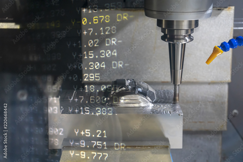 The abstract scene of CNC milling machine and the G-code data cutting ...