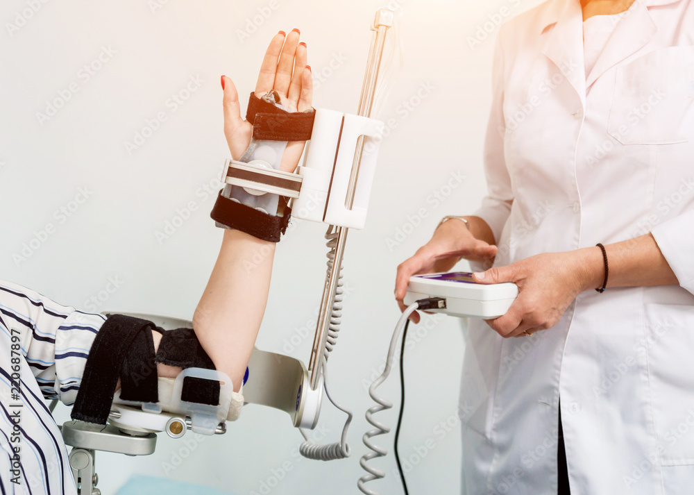 Patient on CPM (continuous passive range of motion) machines. Stock ...