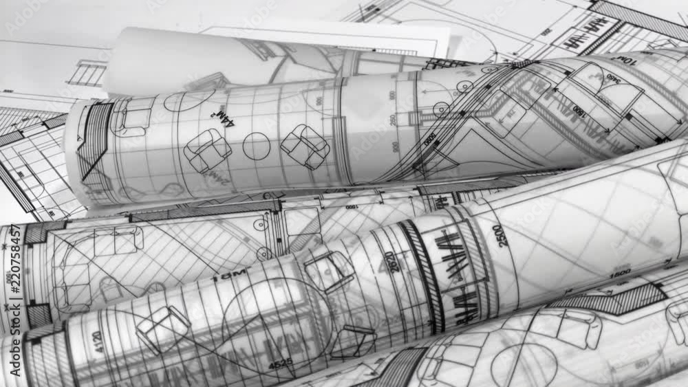 Blueprints - rolls of architectural drawings smoothly rotate on the ...