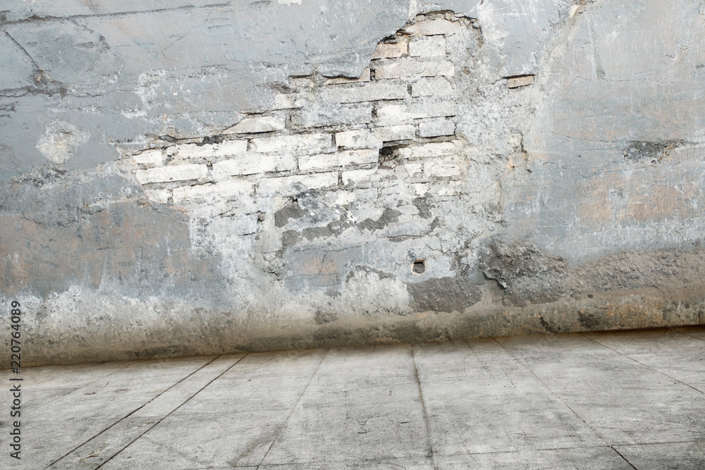 Ruined brick wall with dirty floor Stock Photo | Adobe Stock