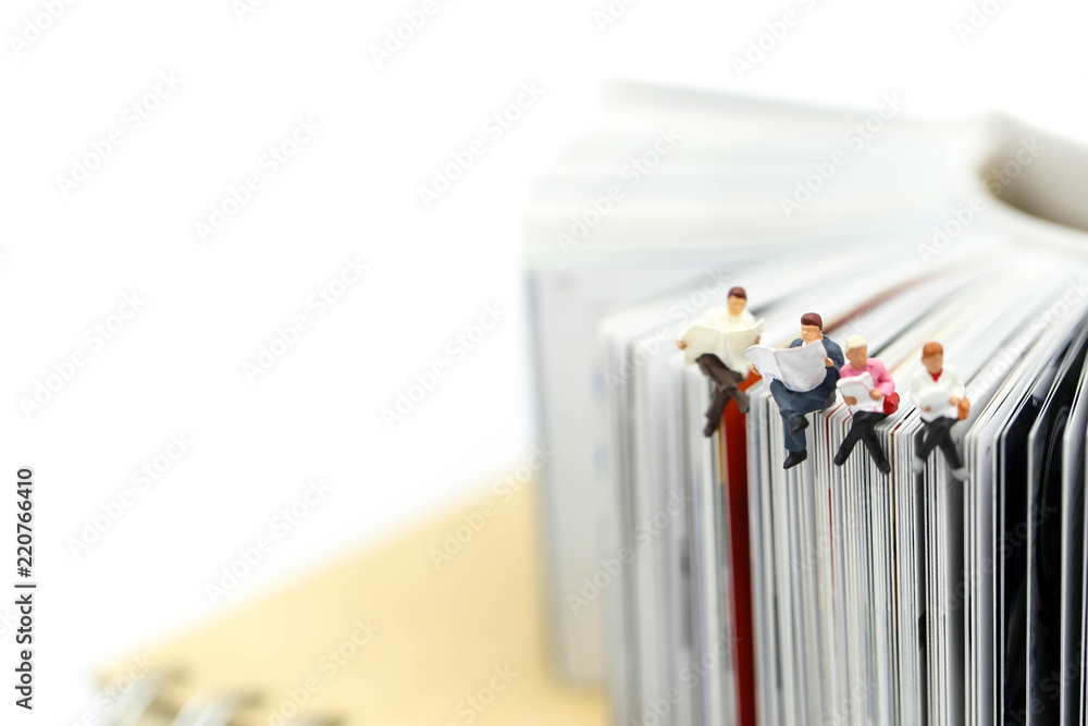 Miniature people : reading a book using concept of Read a book day ...