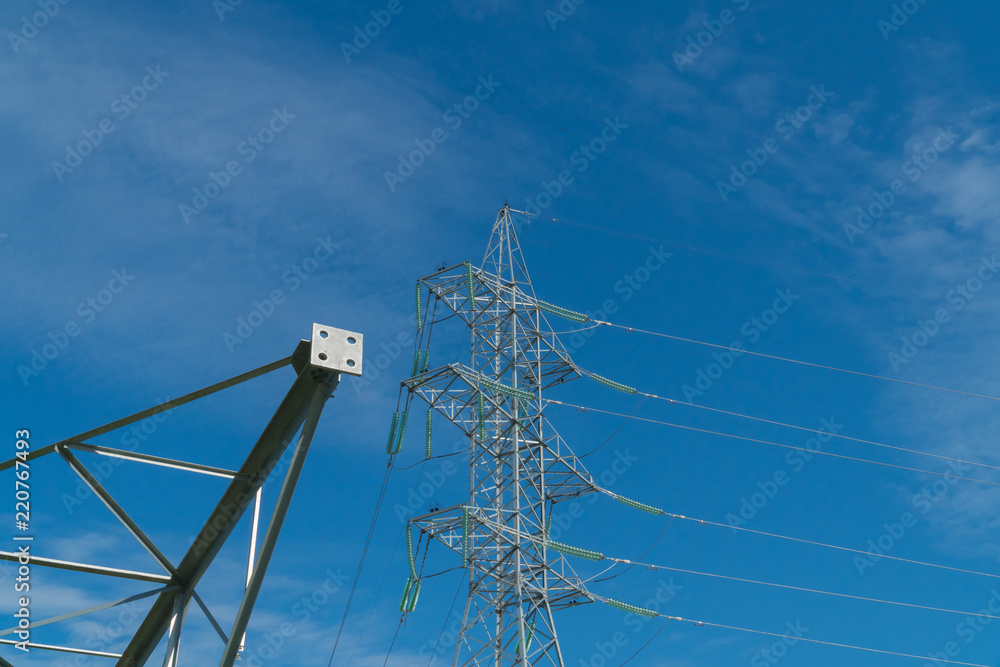 New poles for power lines lying on the ground. For the next ...