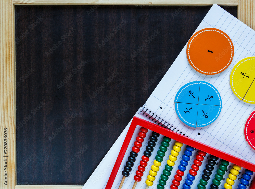 colorful fractions and abacus on the classboard. Education, interesting ...