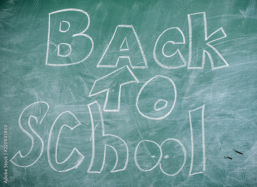 Back to school it is never late to study. Chalkboard with inscription ...