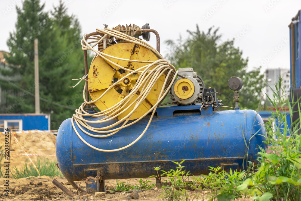Compressor with a storage tank at the construction site Stock Photo ...