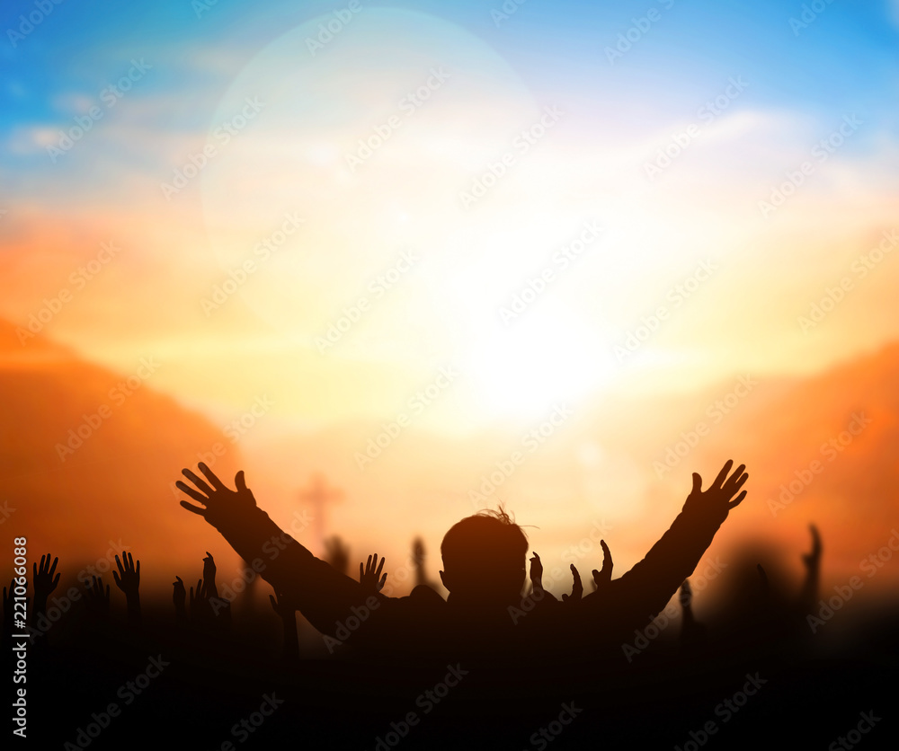 Praise and worship concept:Silhouette of Christian prayers raising hand ... Praise and worship concept:Silhouette of Christian prayers raising hand ...