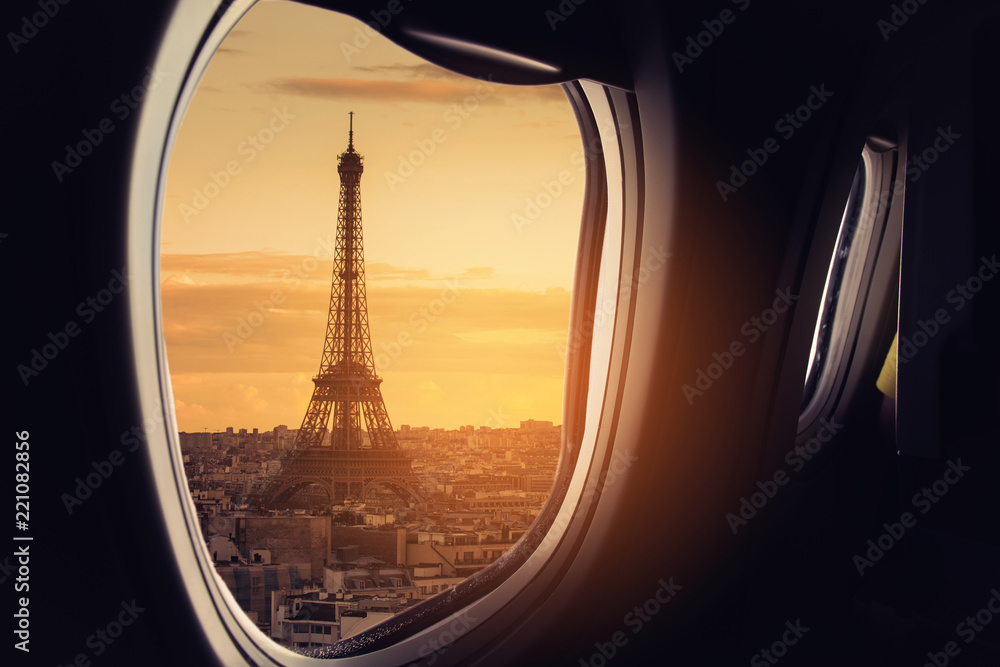 Eiffel as seen through window of an aircraft. Stock Photo | Adobe Stock