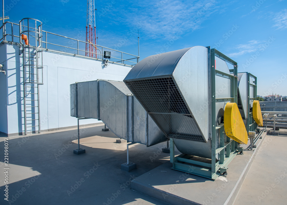 Air compressor machine part of air conditioner system on roof deck with ...