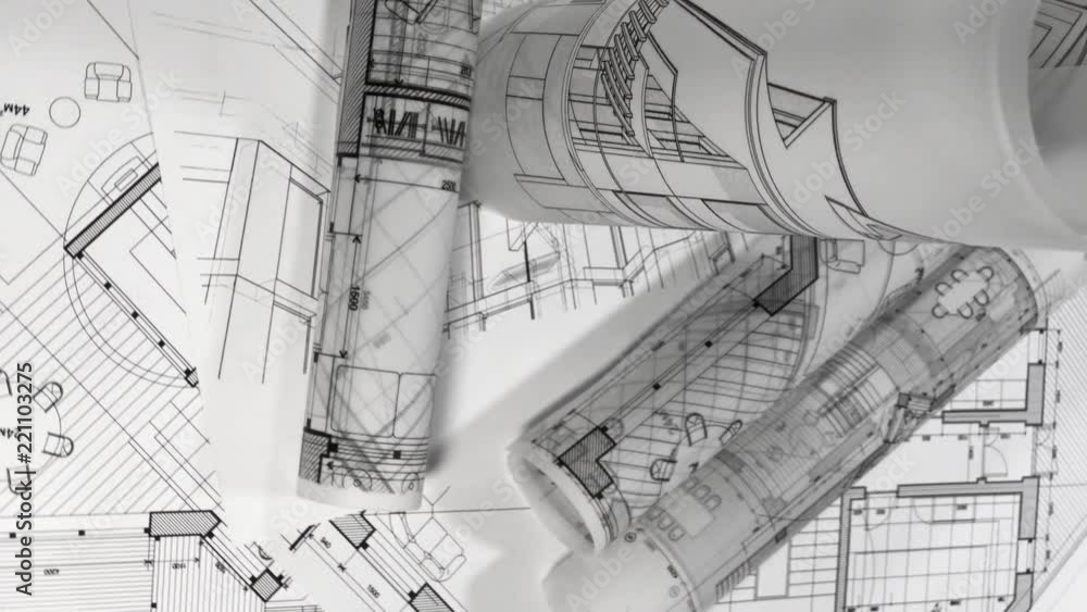 Blueprints - rolls of architectural drawings smoothly rotate on the ...