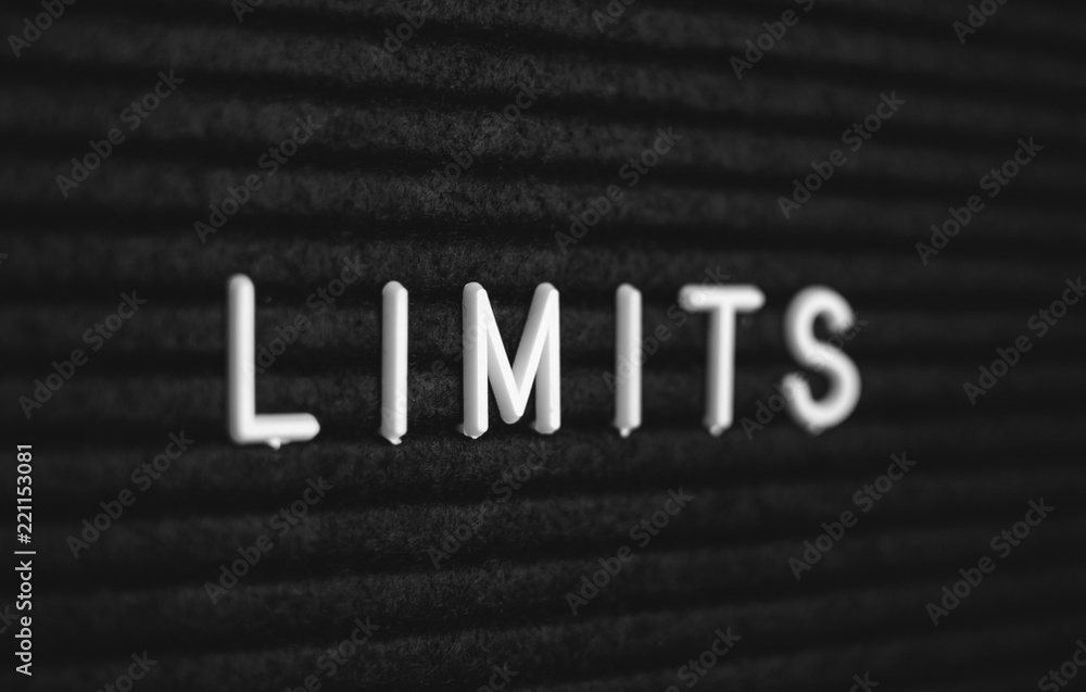 Word limits written on the letter board. White letters on the black ...