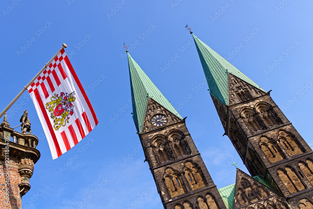 Bremen, Germany - St. Petri cathedral and the Bremen state flag flying ...