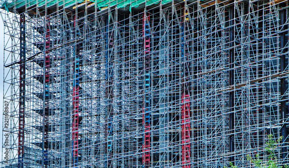 Construction of a high-rise building. Constructions. Abstract Scaffold ...