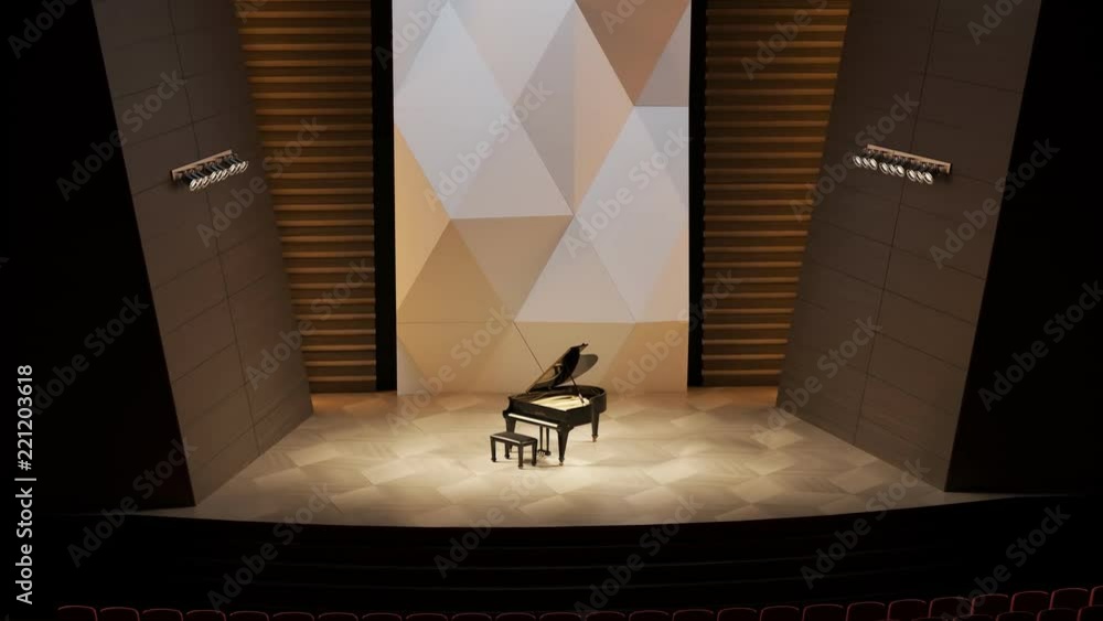 Luxury Grand Piano on stage in a big contemporary, modern concert hall ...