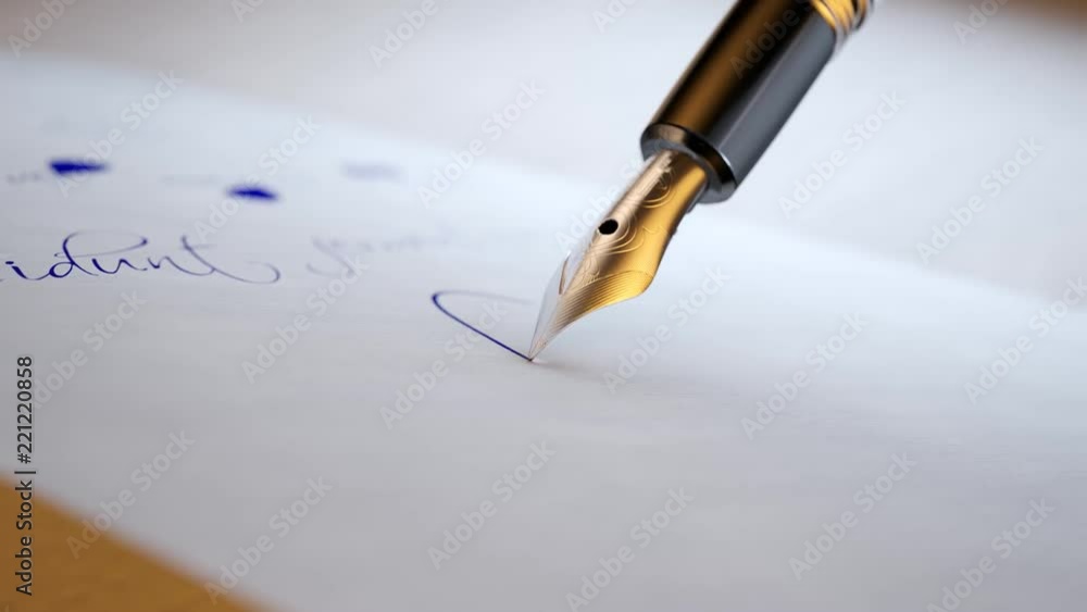 Close up of a quill pen making a check sign with ink in an empty ...