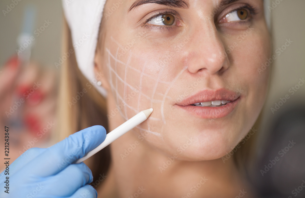 Beautiful young woman with squares grid on her face. Beautiful woman ...