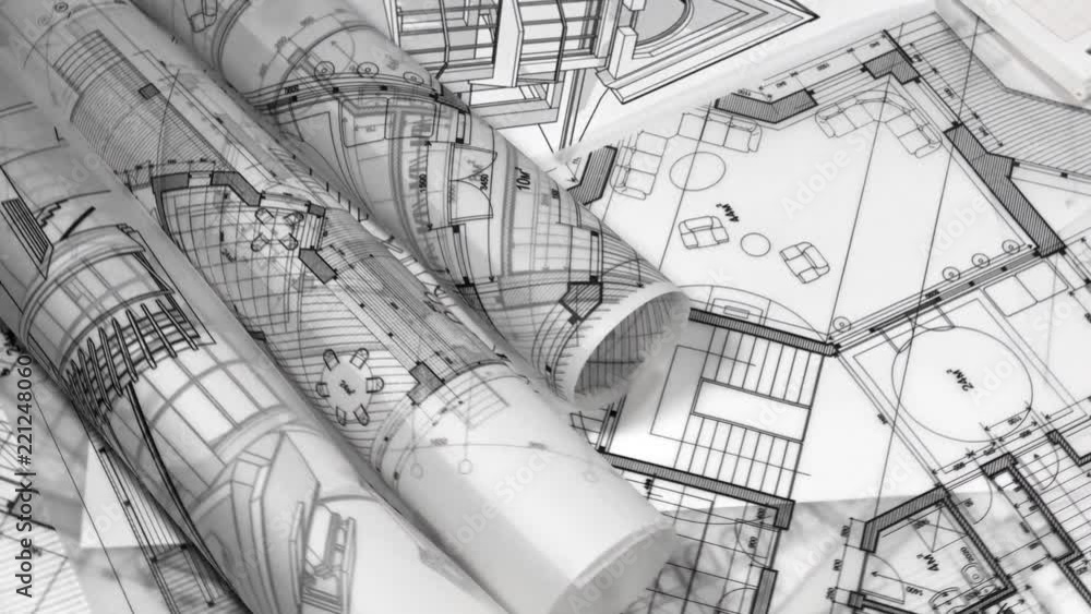 Blueprints - rolls of architectural drawings smoothly rotate on the ...