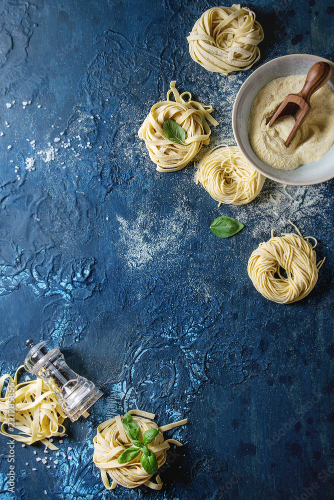 Variety of italian homemade raw uncooked pasta spaghetti and ...