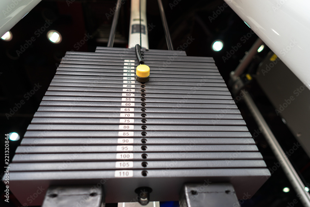 Black metallic or iron heavy plates stacked for sport, exercise, weight ...