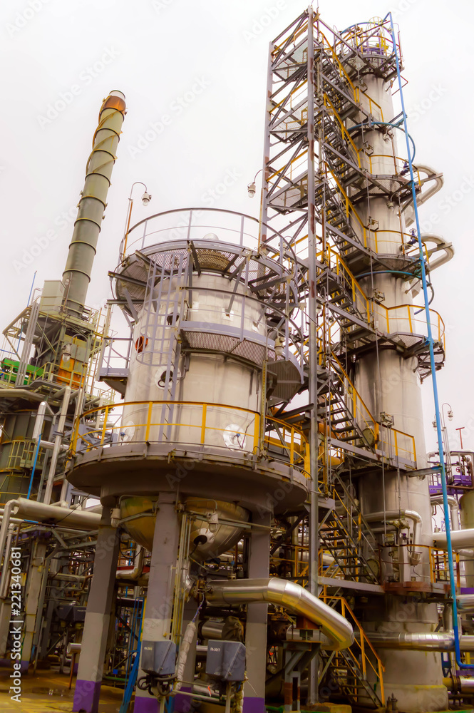 Installation for processing oil with columns and pipes. Refinery. Oil ...