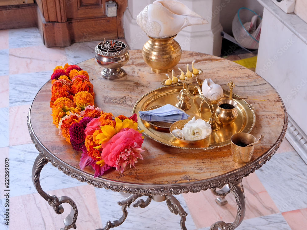 Puja tray and accessories for worship in the Hare Krishna temple. Stock ...
