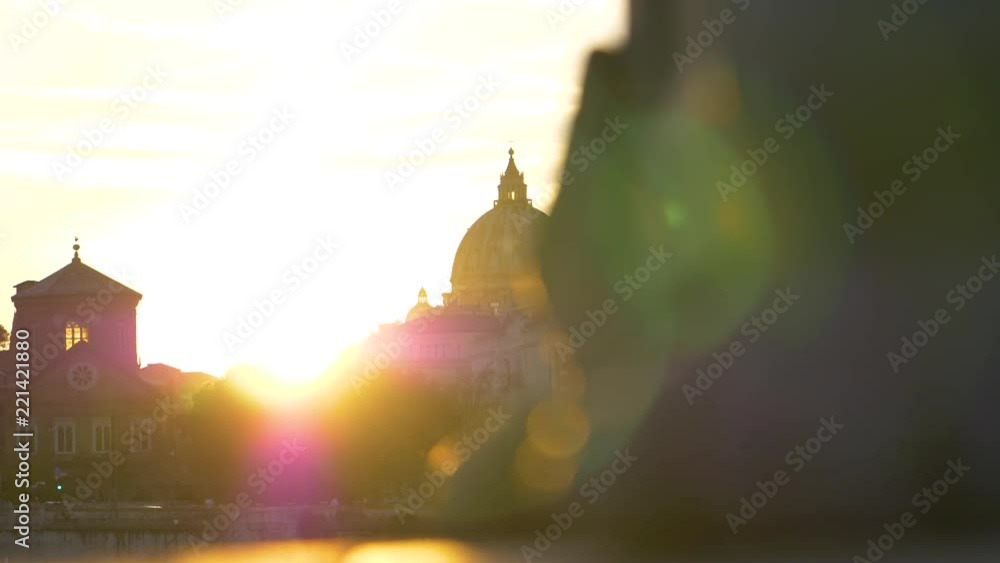 LENS FLARE: Bright golden sun rays shine past the historic cathedral in ...