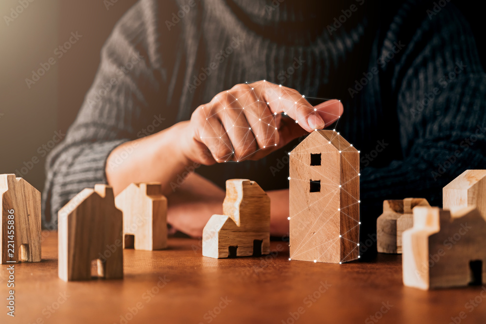 house design decision ideas concept with man hand pick house shape ...