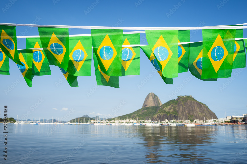 Brazilian flag bunting at Praia Vermelha Red Beach at Sugarloaf ...