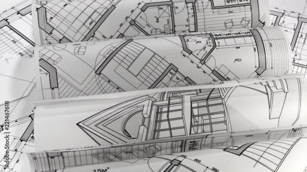 Blueprints - rolls of architectural drawings smoothly rotate on the ...