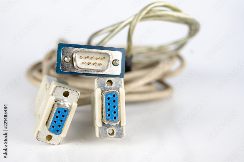 Foto de Old PC cables on a white table .. Com and lpt connectors for ...