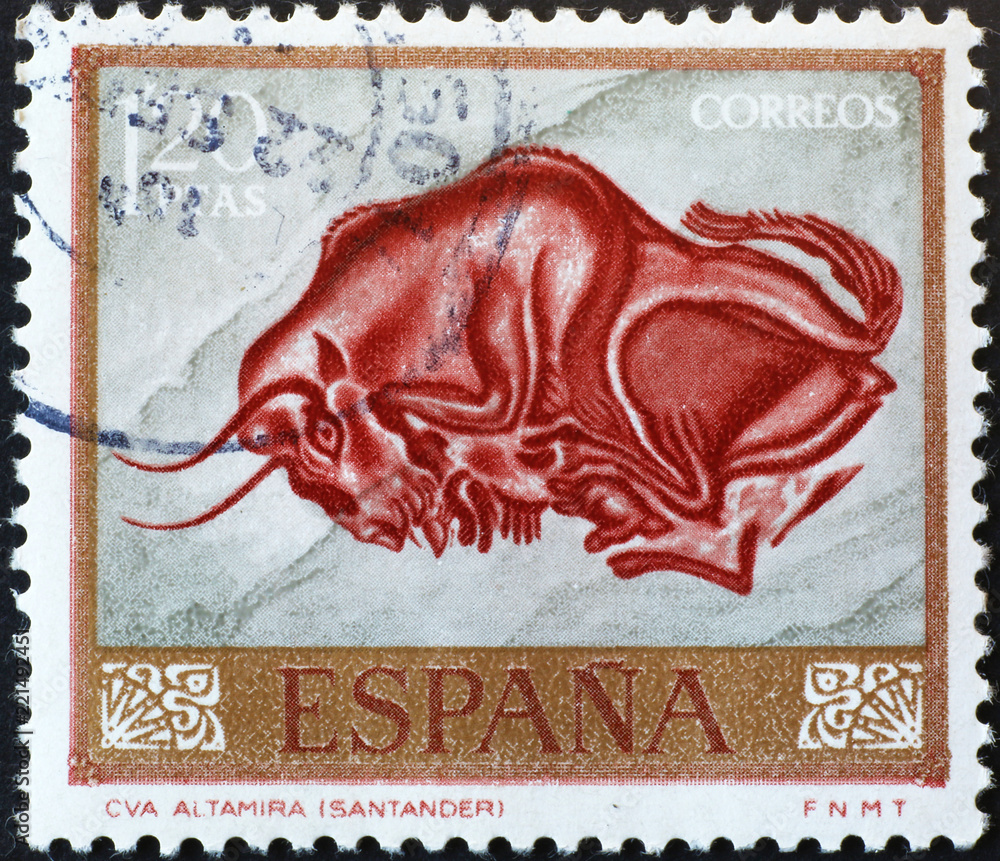 Prehistoric depiction of aurochs on spanish postage stamp Stock Photo ...
