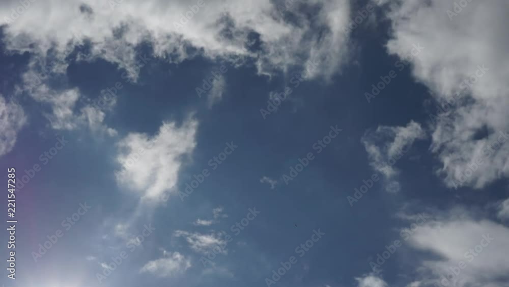 White clouds running over blue sky, Time-Lapse, loop-able, cloudscape ...