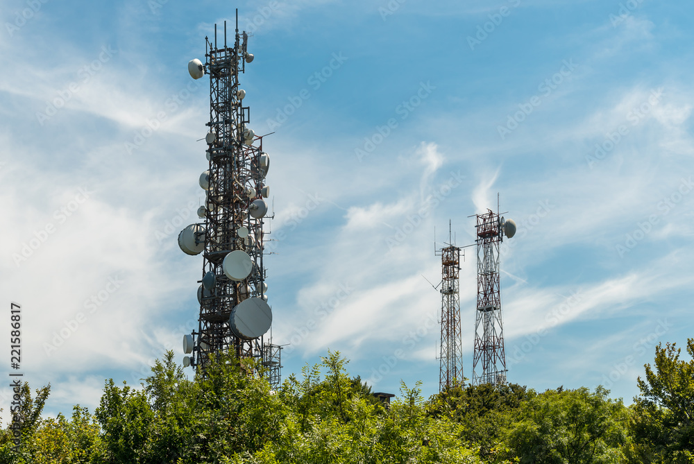 Iron Telecommunication tower with group of parabolic antennas. Stock ...
