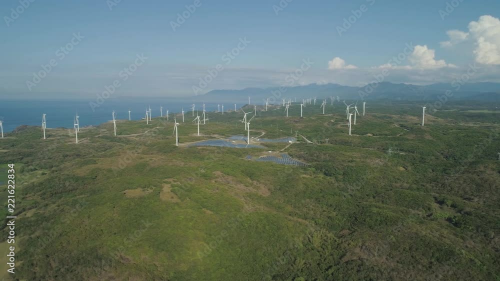 Aerial view of Windmills for electric power production on the seashore ...