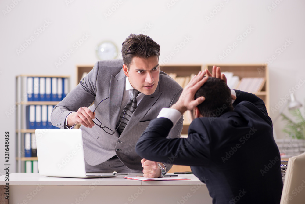 Angry boss shouting at his employee Stock Photo | Adobe Stock
