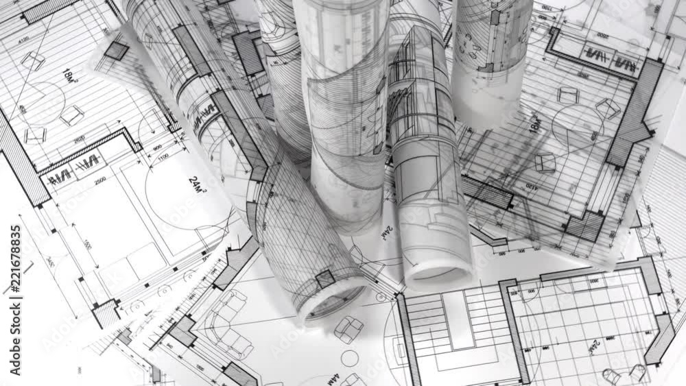 Blueprints - rolls of architectural drawings smoothly rotate on the ...