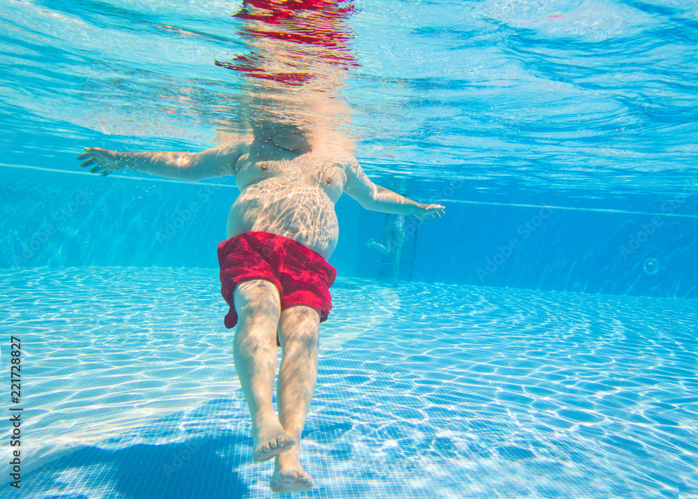 fat man in the pool Stock Photo | Adobe Stock