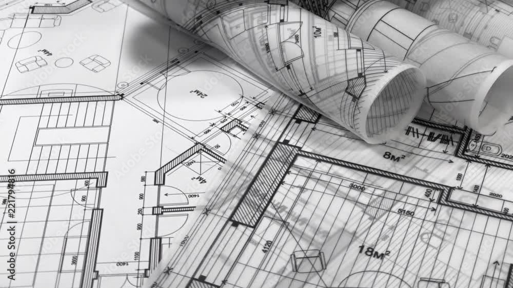Video „Blueprints - rolls of architectural drawings smoothly rotate on ...