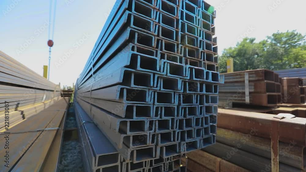 The metal channel laid in rows in the open metal warehouse, the large ...