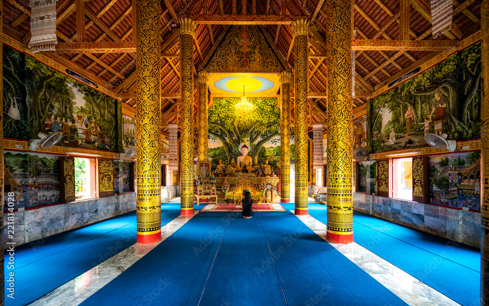 Golden Buddha statue at temple of Thailand. Large prayer hall. Peaceful ...