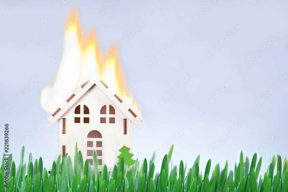 Safety fire concept. Toy house with flames. Burning model house. Stock ...