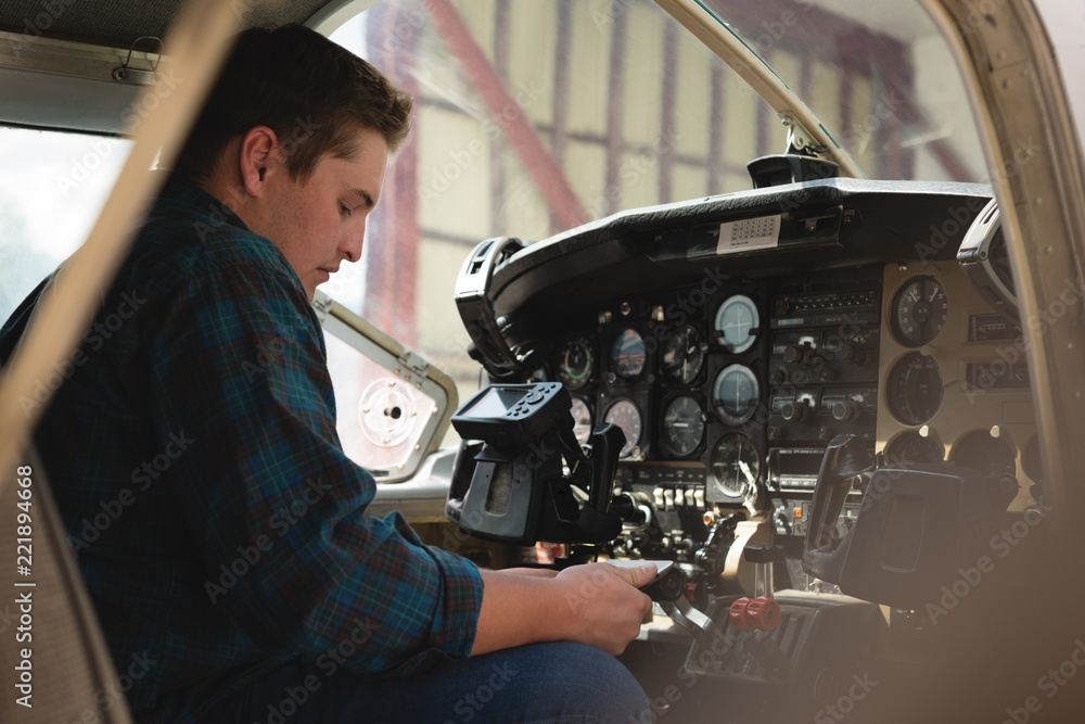 Engineer operating cockpit Stock Photo | Adobe Stock