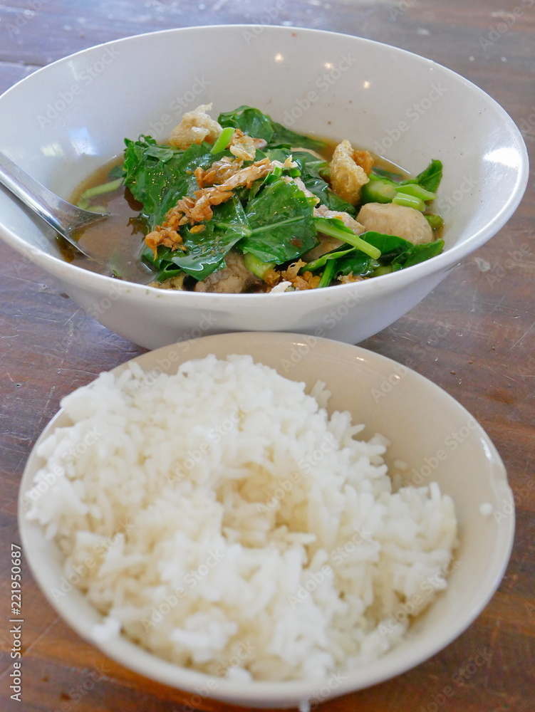 Selective focus of tasty Thai style vegetable stew pork soup with ...