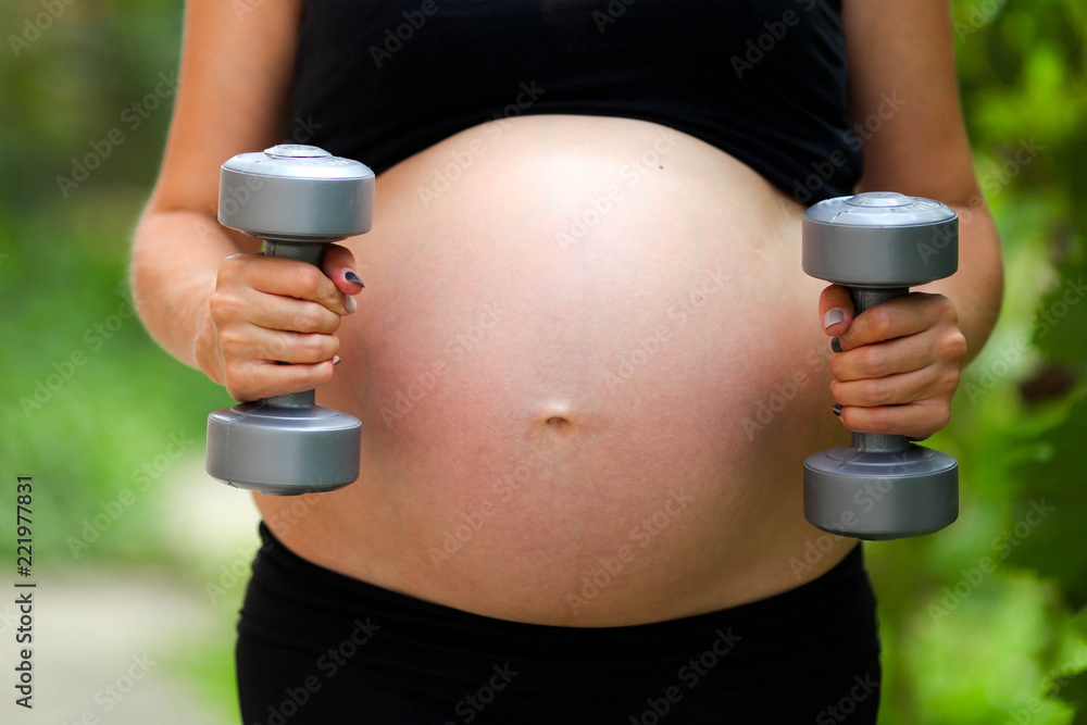 Pregnant Female Do Exercise Side View Body Part Lifting Dumbbells
